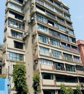 Gangotri Building Walkeshwar – 2 BHK Semi-Furnished Flat for Sale